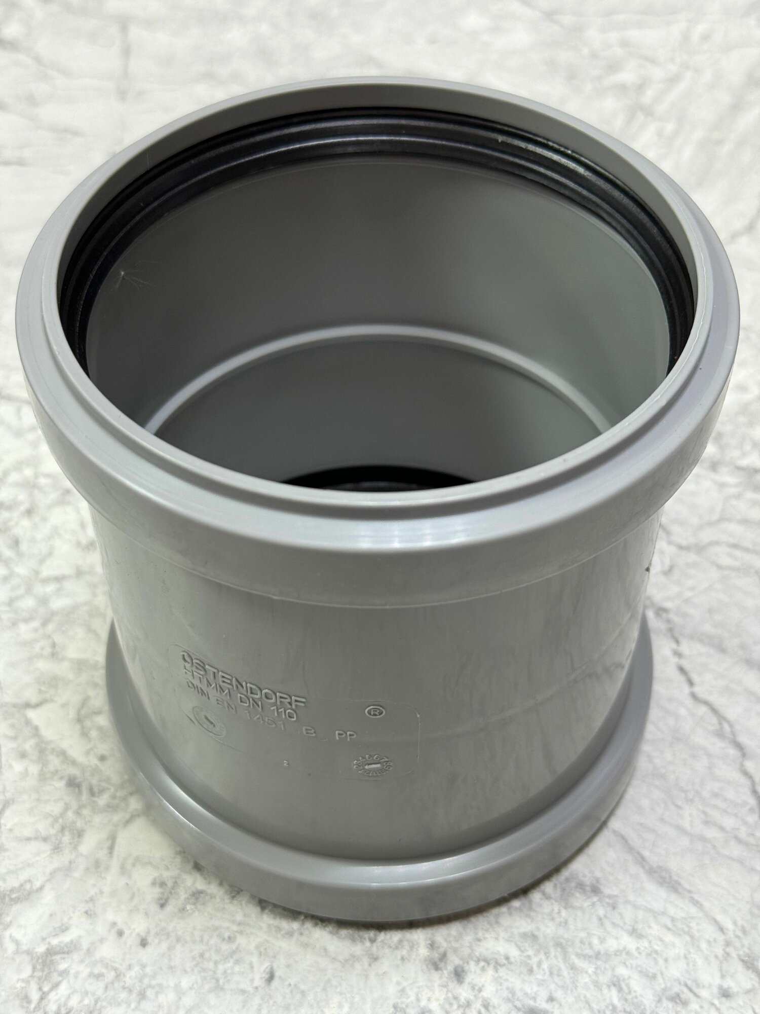 Муфта двойная двухраструбная 110 серая Ostendorf (с ограничителем внутри)