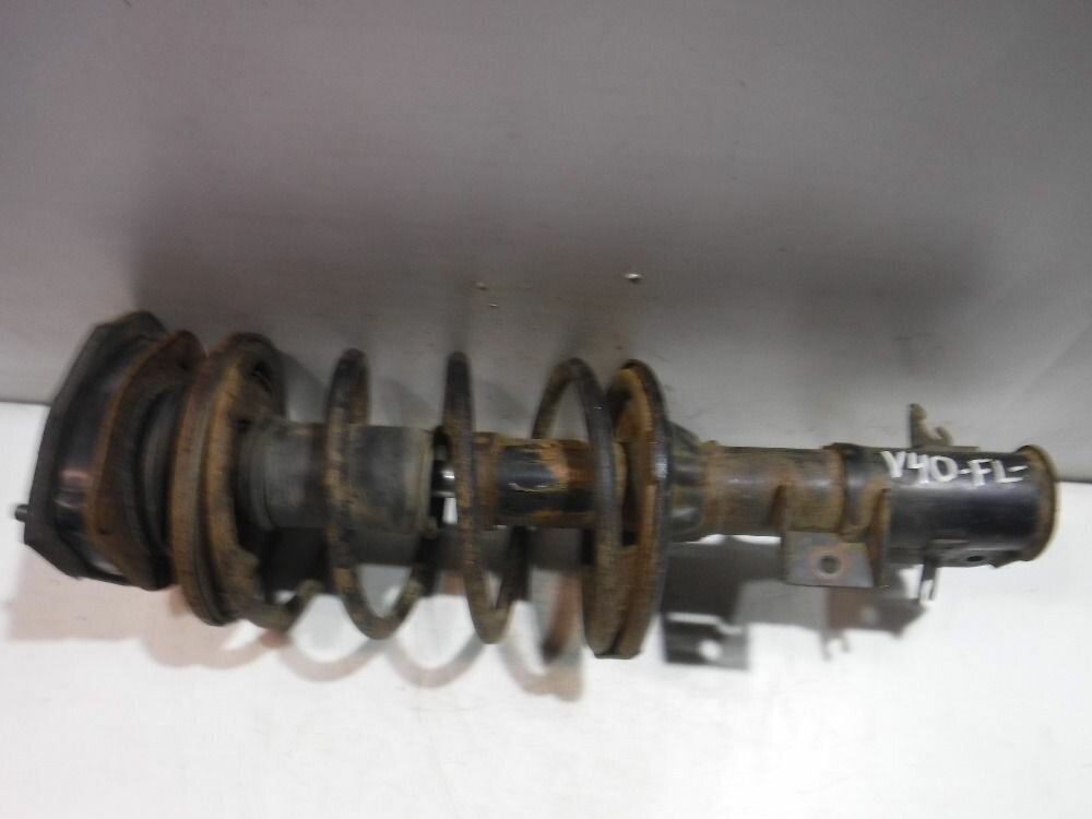 Амортизатор передний левый Volvo V40