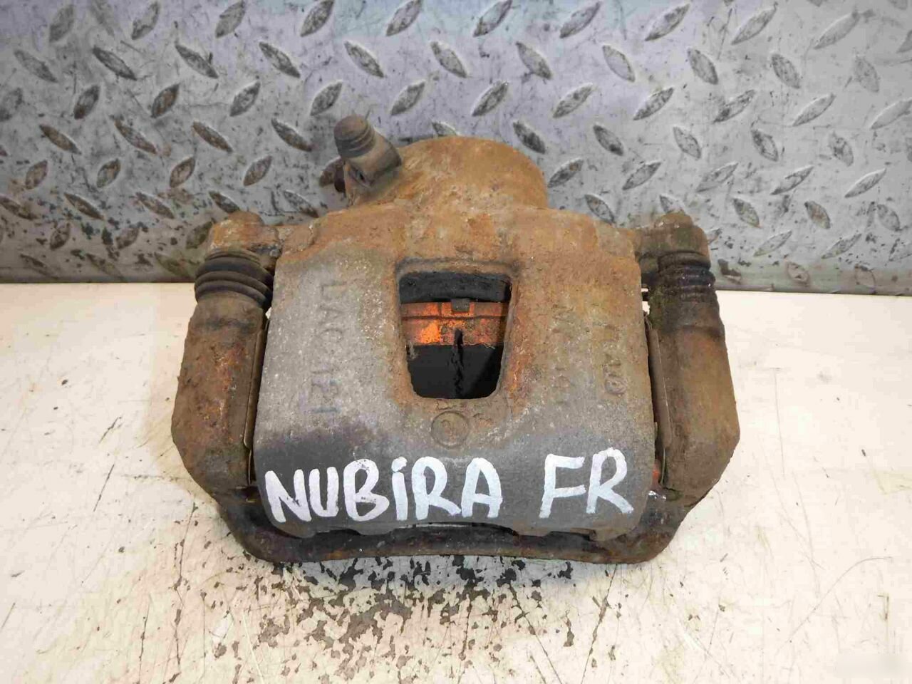 Суппорт тормозной передний правый Daewoo Nubira I (1997—2000) 96268457