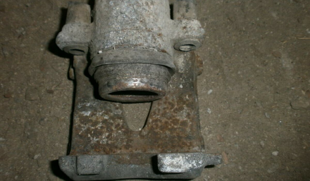 Суппорт передний Octavia Tour (A4 1U-) Skoda