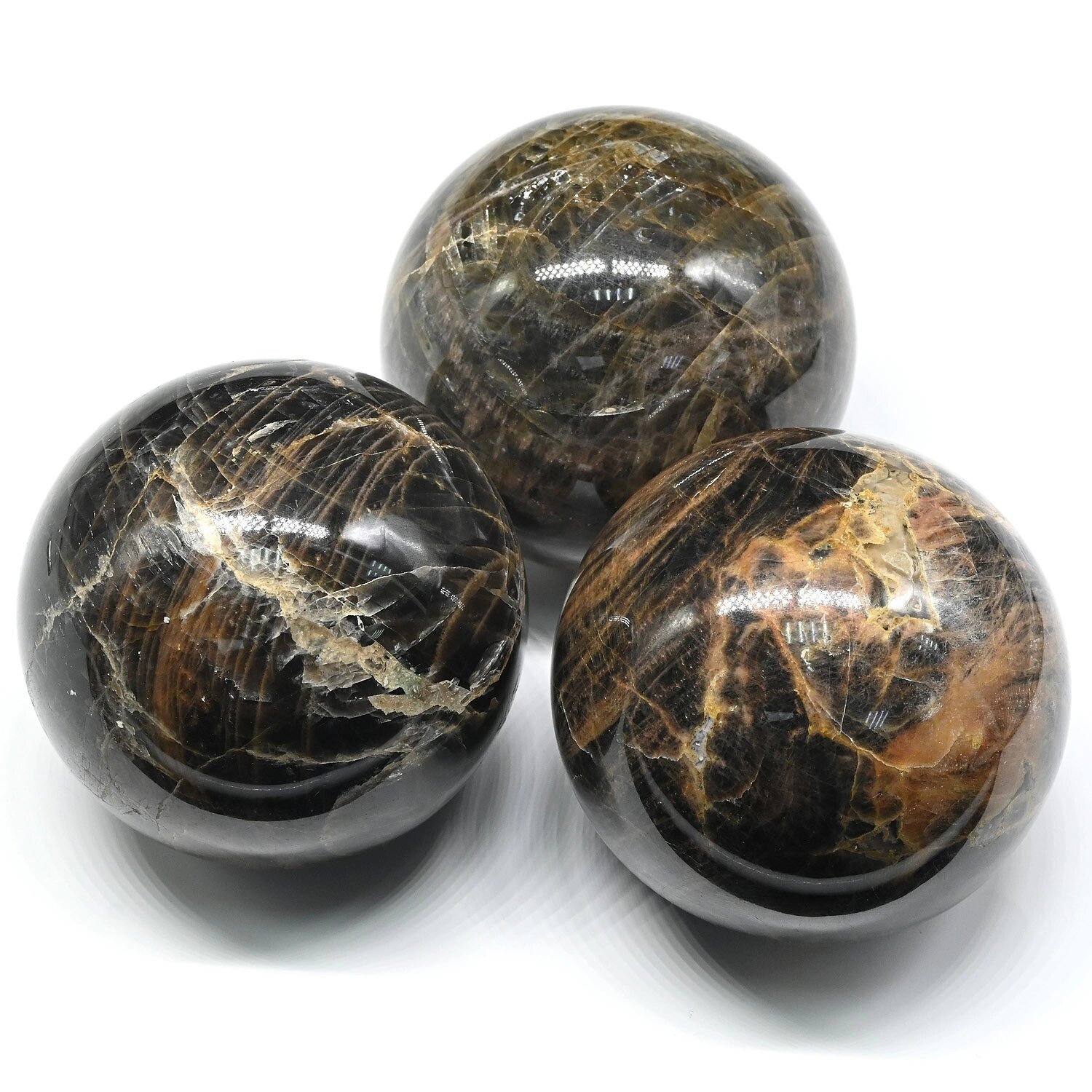 Лунный камень шар цв. черный, диаметр 73-74мм .