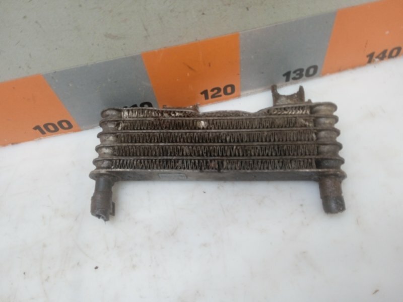 Б/У Киа Каренс 1 Радиатор масляный Kia Carens 2004 1, FJ 277386 Hyundai-KIA арт. 0K2KB199F0