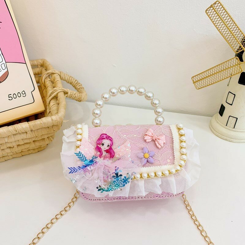 Детская сумочка легкая стильная из искусственной кожи с жемчугом для девочек с бантом и цепочкой розовая