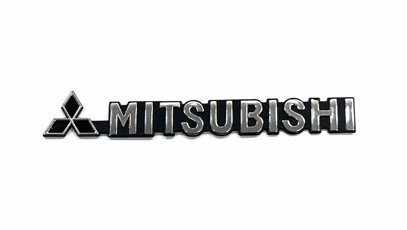 Шильдик "Mitsubichi" на багажник авто хром черный (длина 19см). Мицубиси