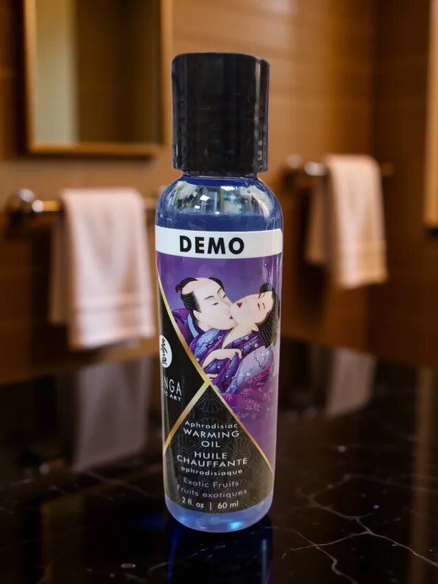 Масло для массажа Shunga DEMO со вкусом и ароматом экзотических фруктов, разогревающее, 60 мл