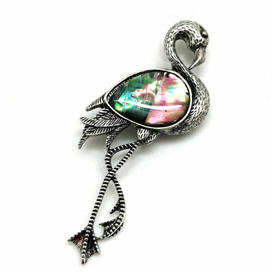 Брошь, гелиотис