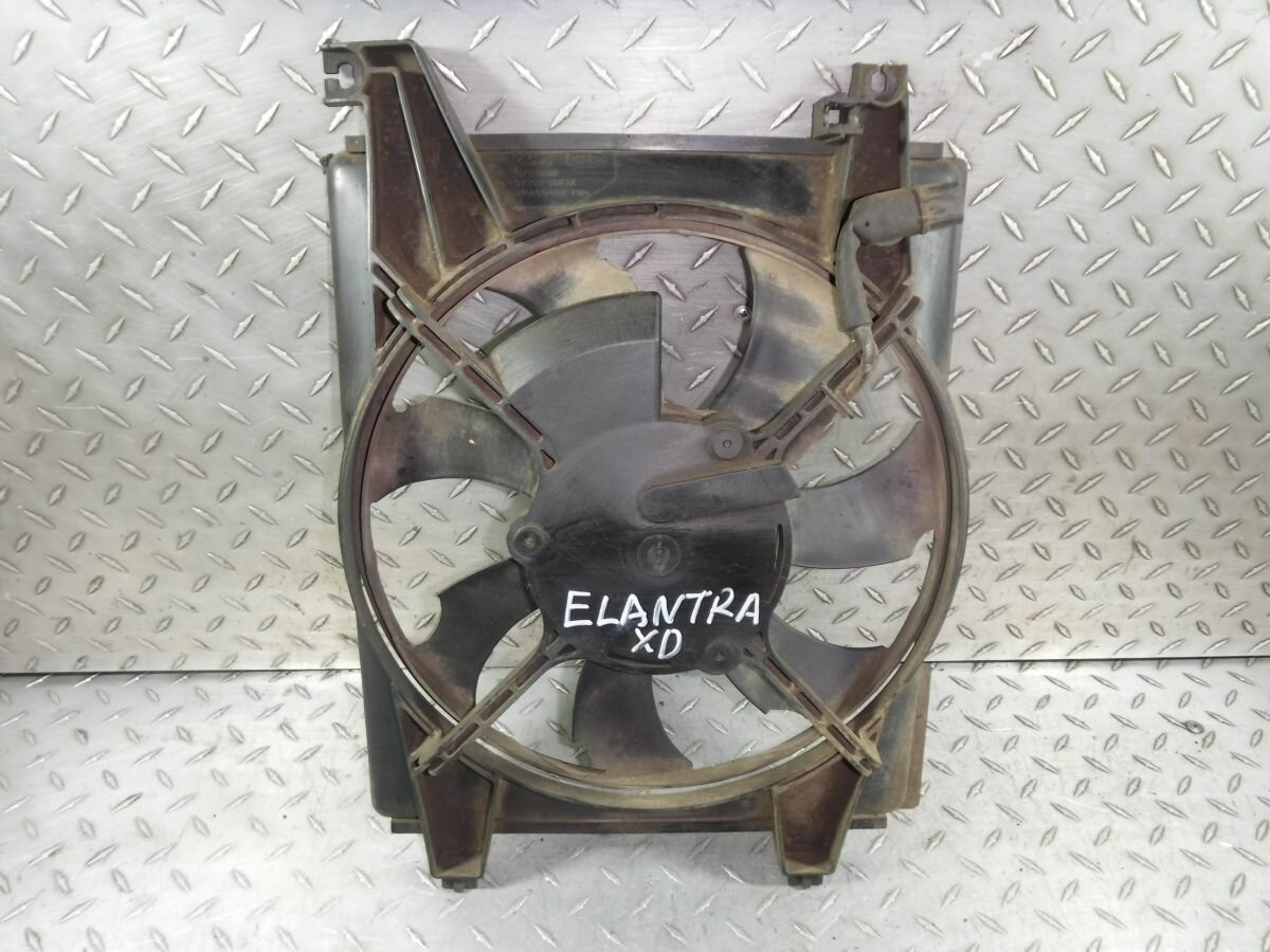 Вентилятор радиатора кондиционера Hyundai Elantra III рестайлинг (2003—2010) 977302D000