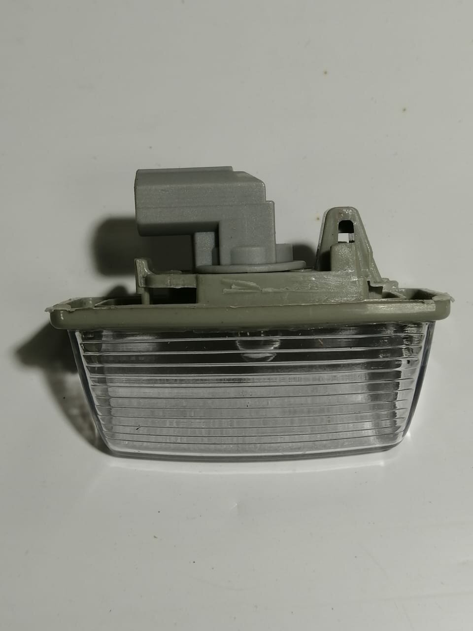 Фонарь номерного знака правый Lifan Solano (620) [1.6 16V CVT седан] B4108200