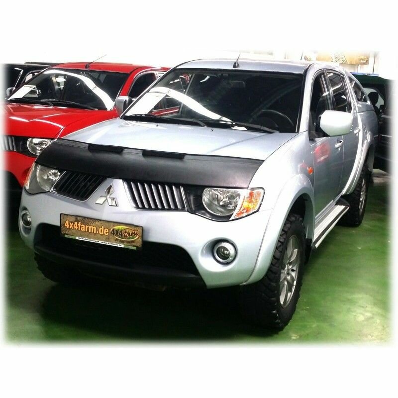 Дефлектор капота Кожаный для MITSUBISHI L200 PAJERO SPORT 2008 -2013 II (Митсубиси Паджеро Спорт)