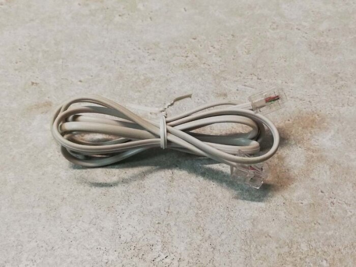 Кабель телефонный аппарат-розетка 1 м серый