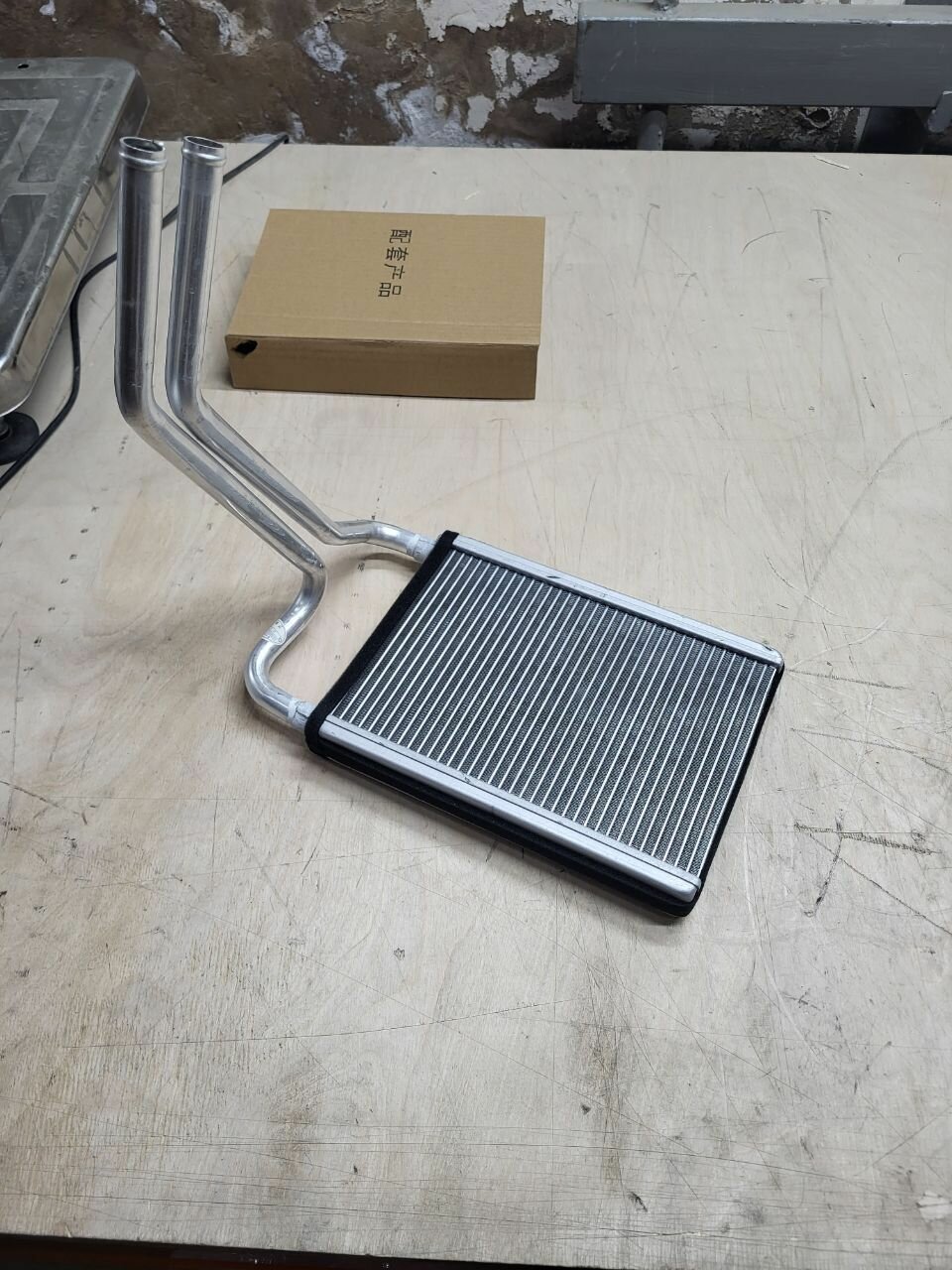 Радиатор отопителя Emgrand X7 (1017016533)