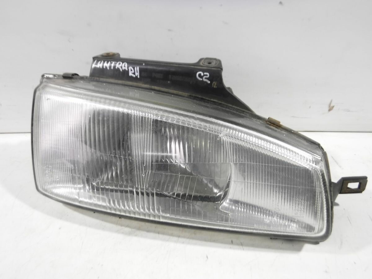Фара правая Hyundai Lantra I (1990—1995) 9210228020