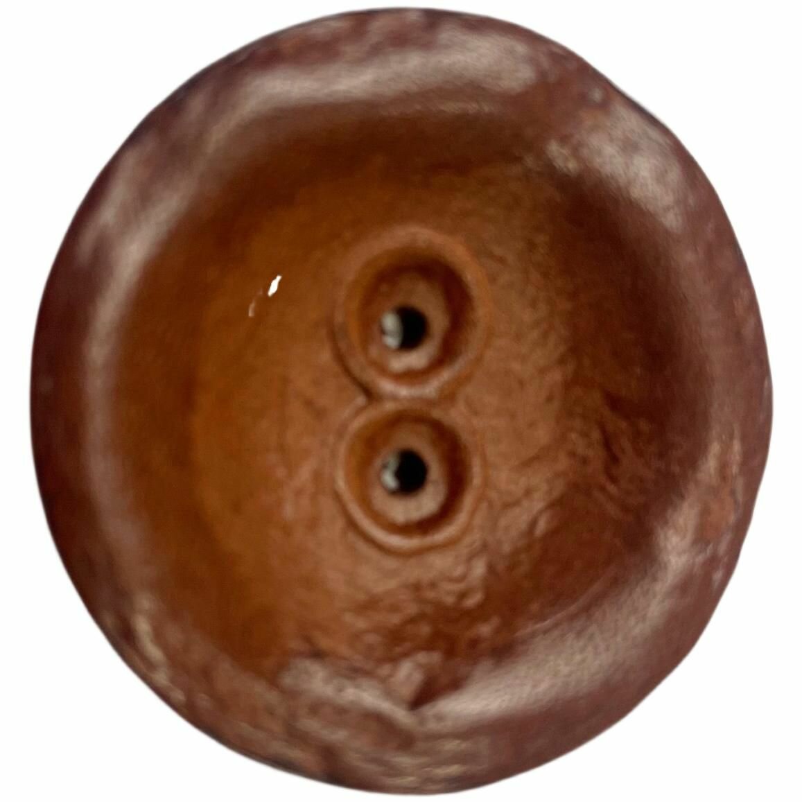 Пуговицы из натуральной кожи, диаметр - 2,5 см, толщина 3 мм, два отверстия. Набор из двух штук. Цвет коричневый.