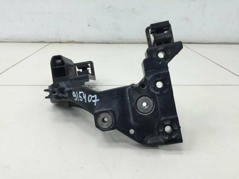 Кронштейн фар правый Kia Ceed JD 2012-2018 кат.номер: 64166A2000