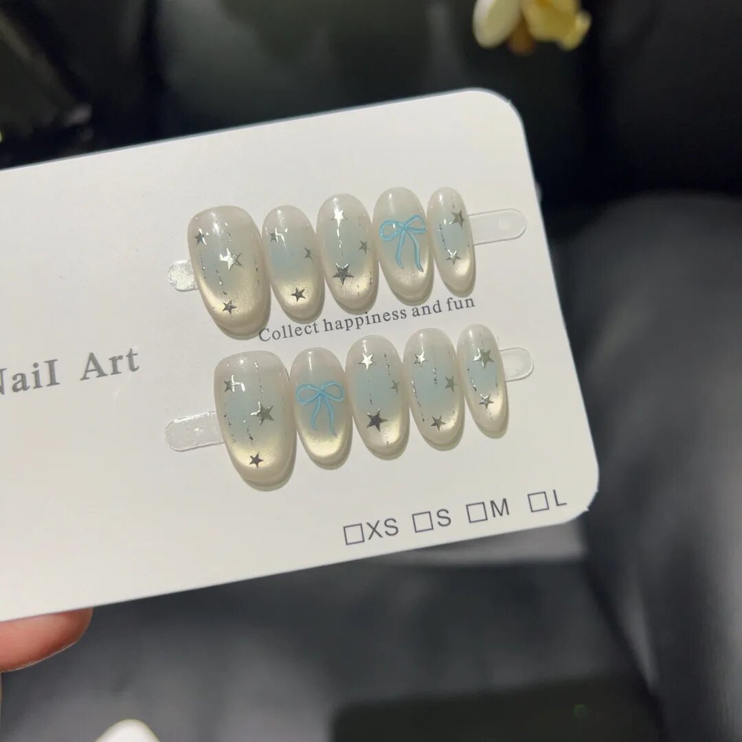 Накладные ногти акриловые голубые овальные с дизайном "кошачий глаз" 1-S