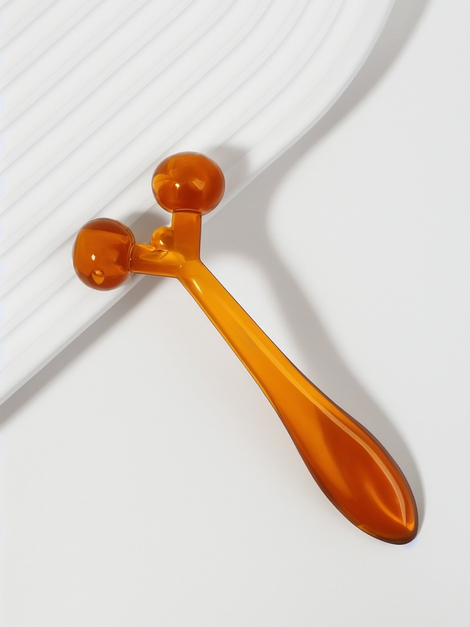 Массажёр для лица и зоны декольте, 2 шара, 14 × 6 × 2 см, цвет коричневый