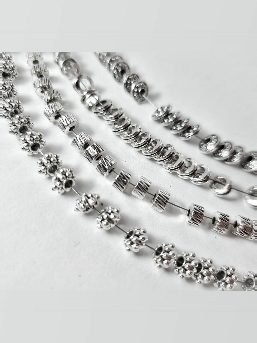 Бусины металлические 5-7мм. 120шт. Цвет стальной.