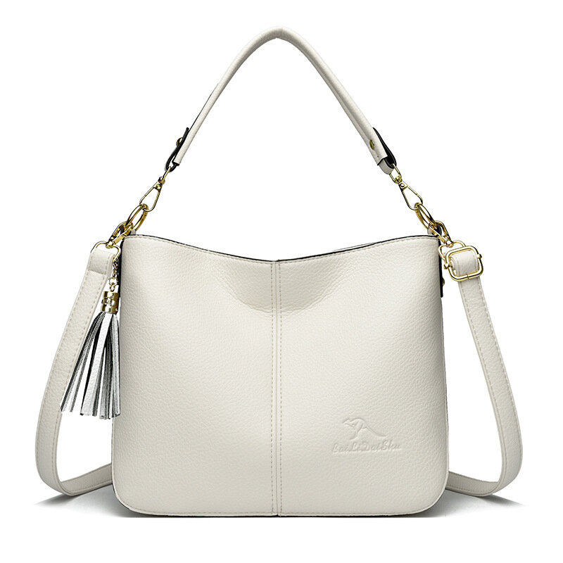 Женская сумка с кисточками, новинка 2025 года, большая вместительная женская сумка из мягкой кожи на плечо, модная сумка для мам среднего возраста, сумка-ведро через плечо