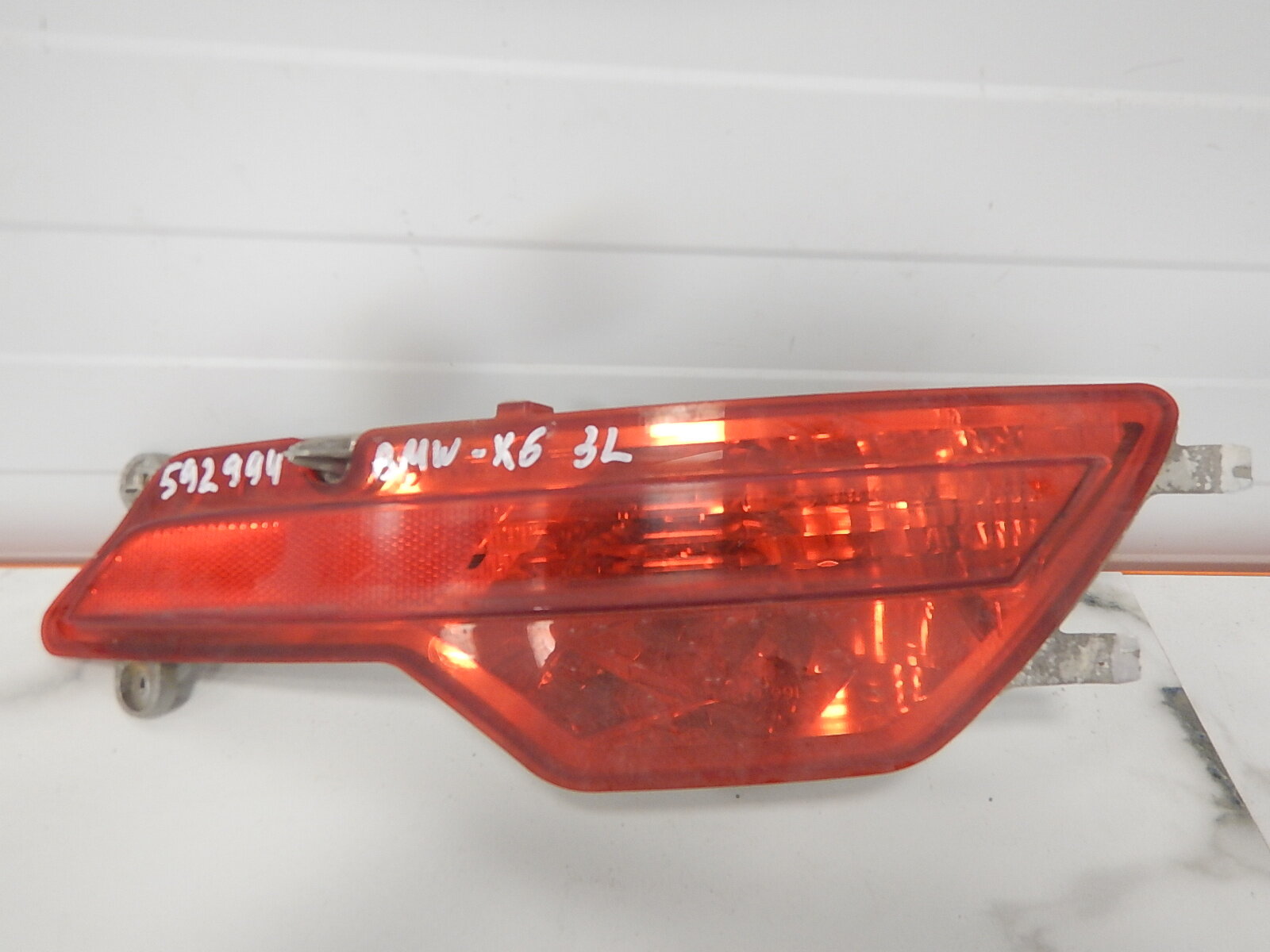 Б/У Фонарь задний противотуманный левый, BMW (БМВ)-X6 (E71) (08-14) BMW X6 (E71) (08-14) Царапины. 592994 BMW арт. 63147...