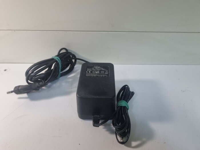 Блок питания внешний 12V 1A OEM AD-121ABDT