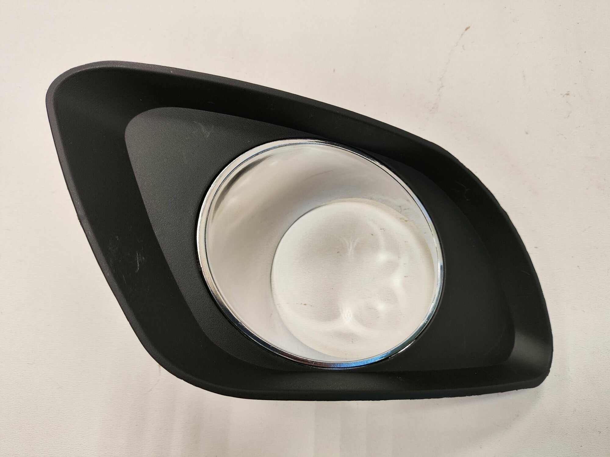 Решетка фары противотуманной левой Geely Emgrand EC7 [1.5 16V 5MT хетчбэк] 1068003045