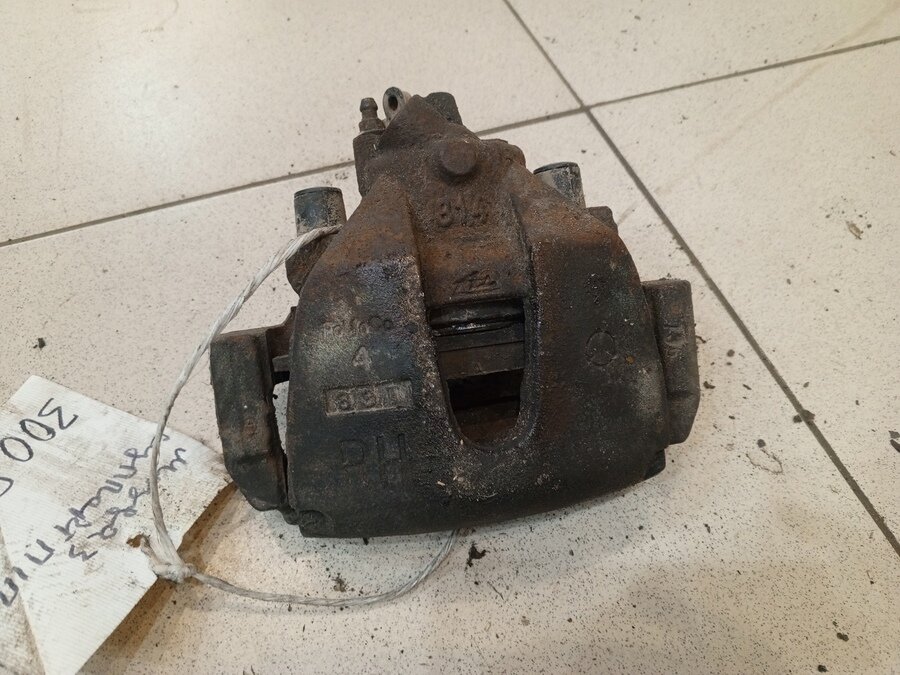 Суппорт передний правый от Mazda 3 bk 2003-2009