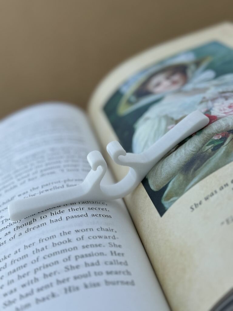 Держатель для книжных страниц