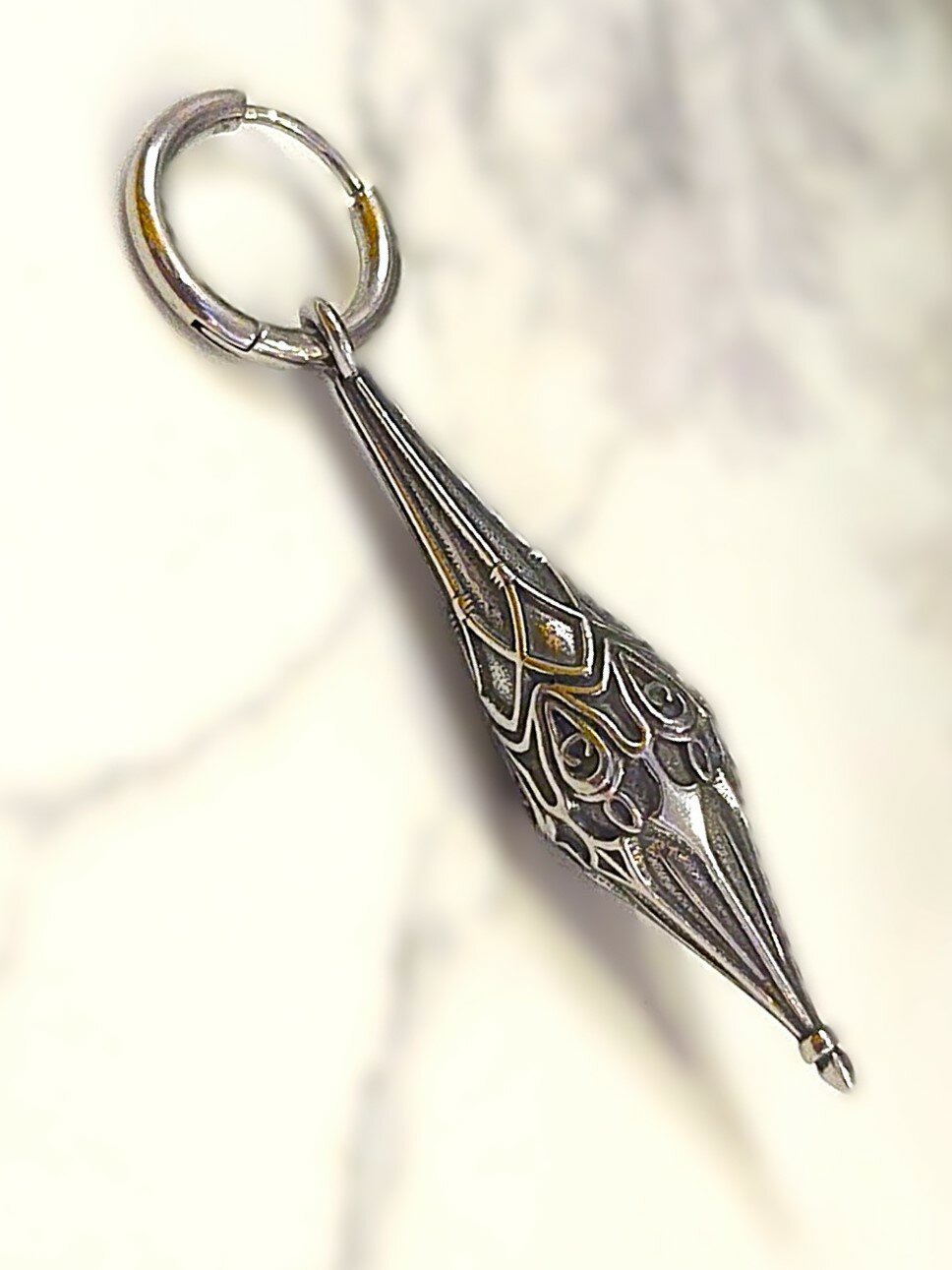 Моносерьга, славянский оберег