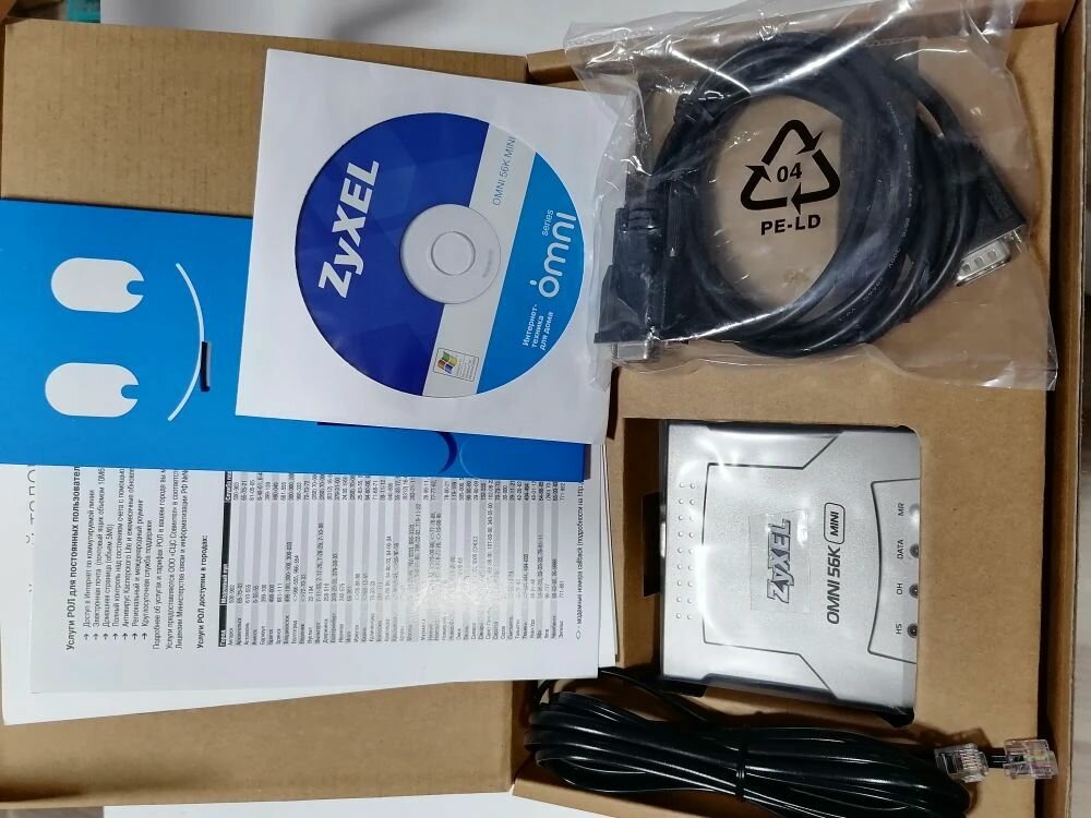 Компактный модем ZyXEL "Omni 56K", с функцией факса, серый металлик