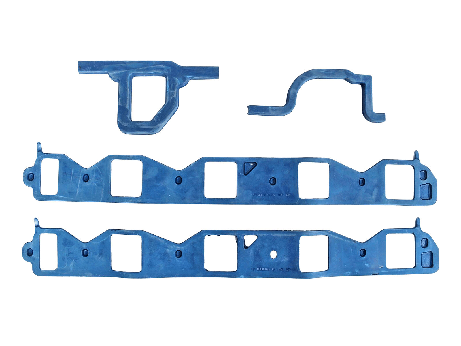 Прокладка ГАЗ-53,66 коллектора впускного комплект 4 детали TRAILER