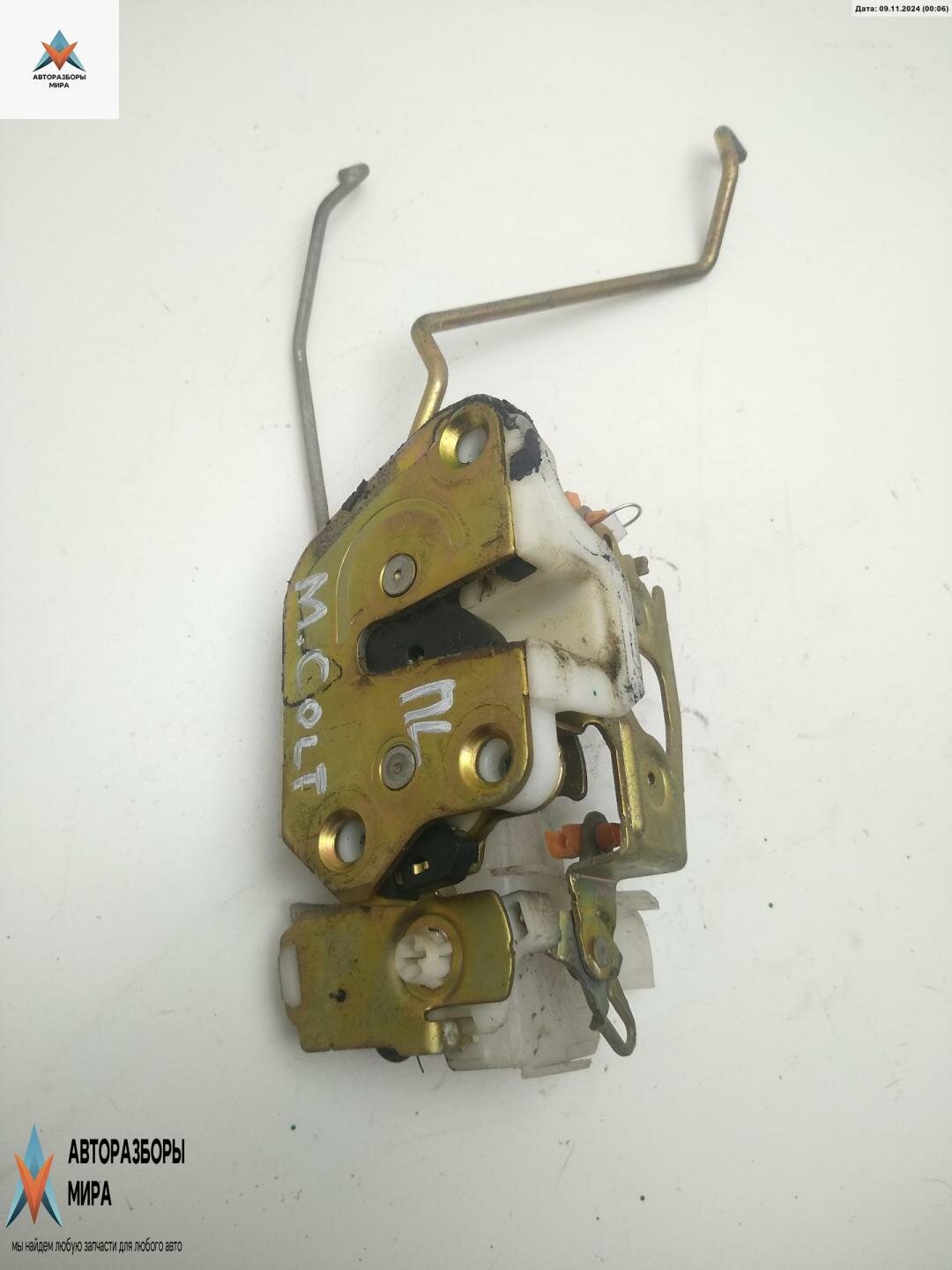 Замок двери передней левой Mitsubishi Colt 5 (CJO) 1998