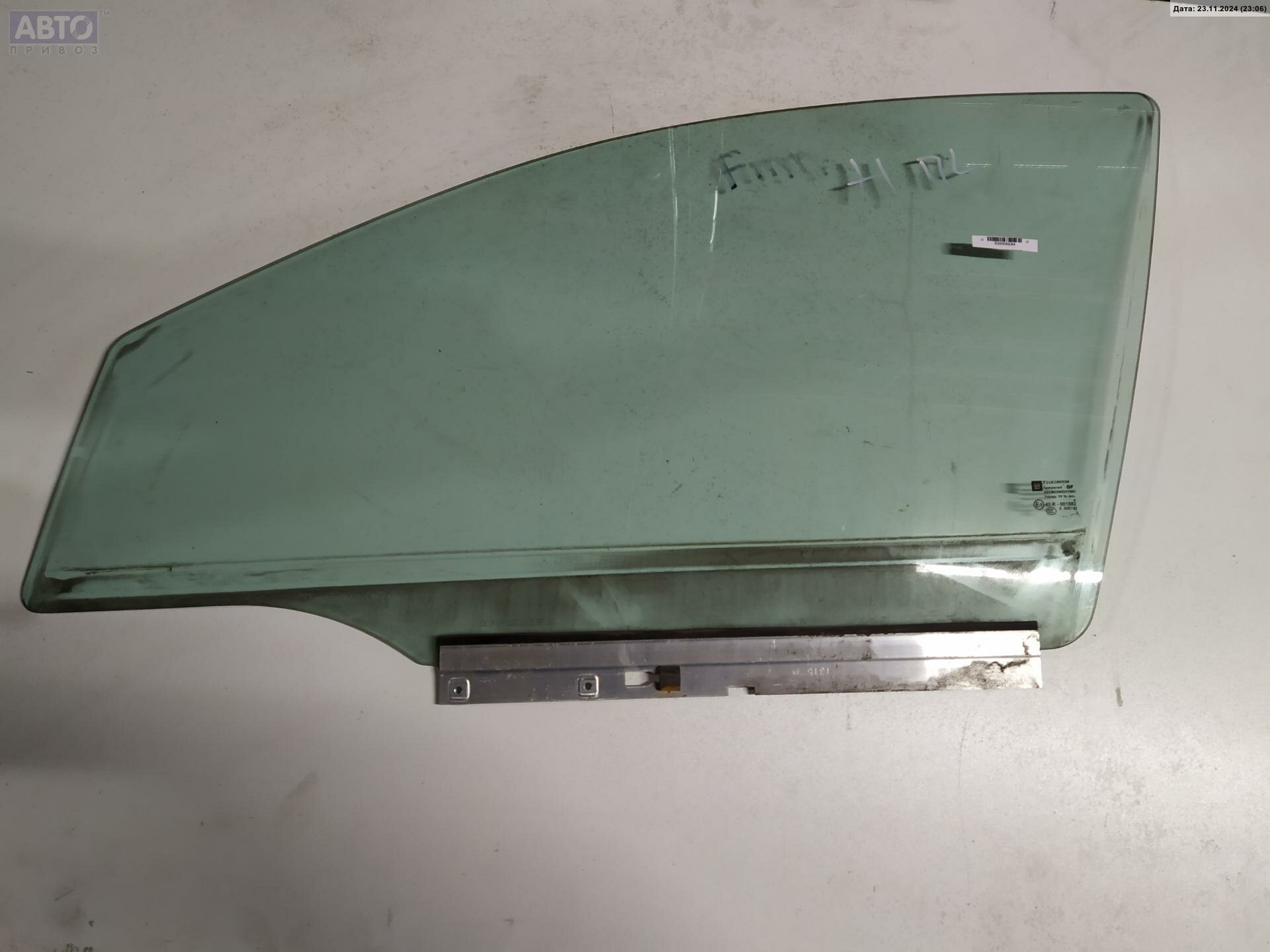 Стекло двери передней левой Opel Astra H (2004-2009)
