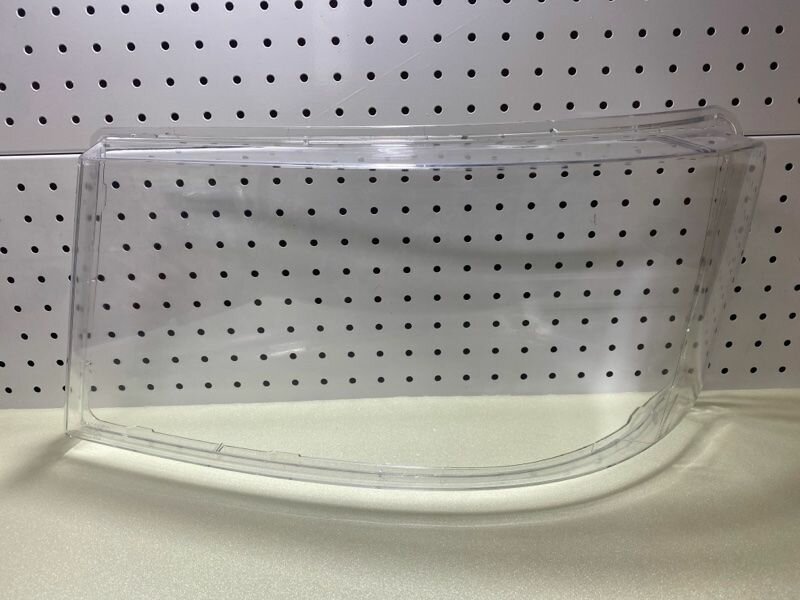 Стекло фары головного света скания 6 серия пластик левое (SCANIA)