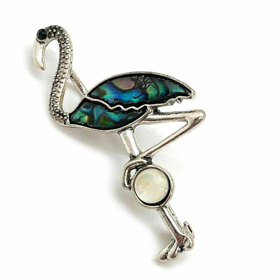 Брошь, гелиотис