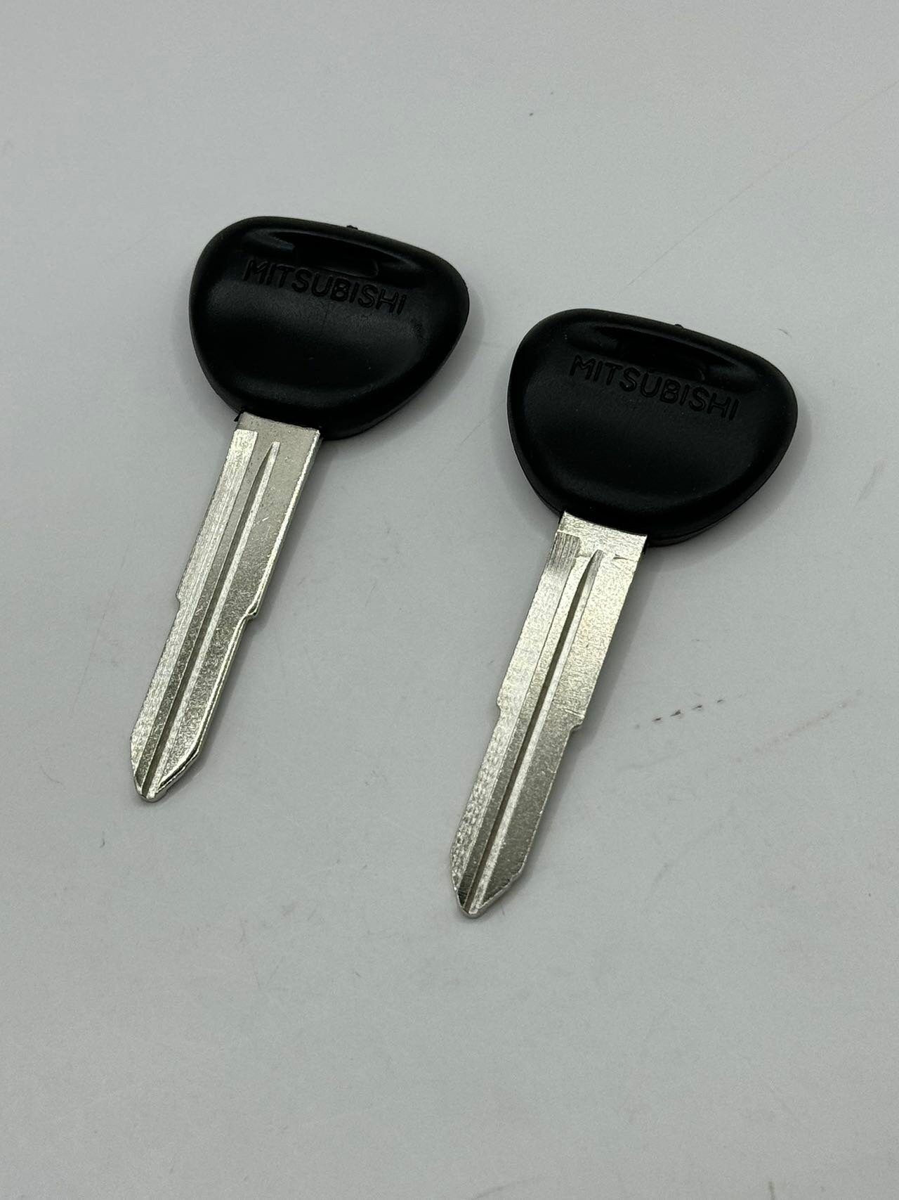 Заготовка ключа Мицубиси MIT 7RP77_MIT-7DP_ а/пласт. MITSUBISH (D-025a) 10 шт .