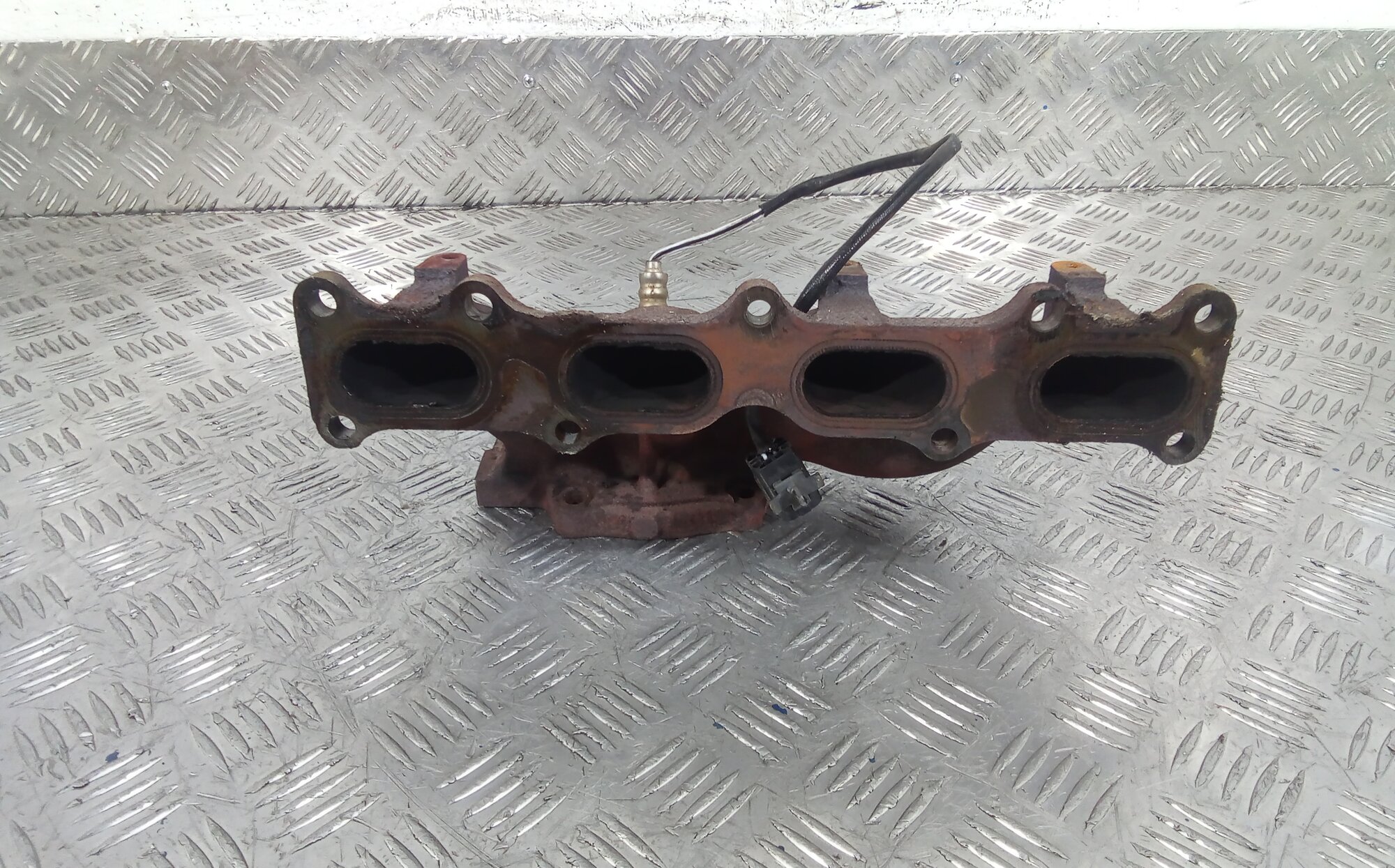 Выпускной коллектор бензиновый MAZDA DEMIO 1