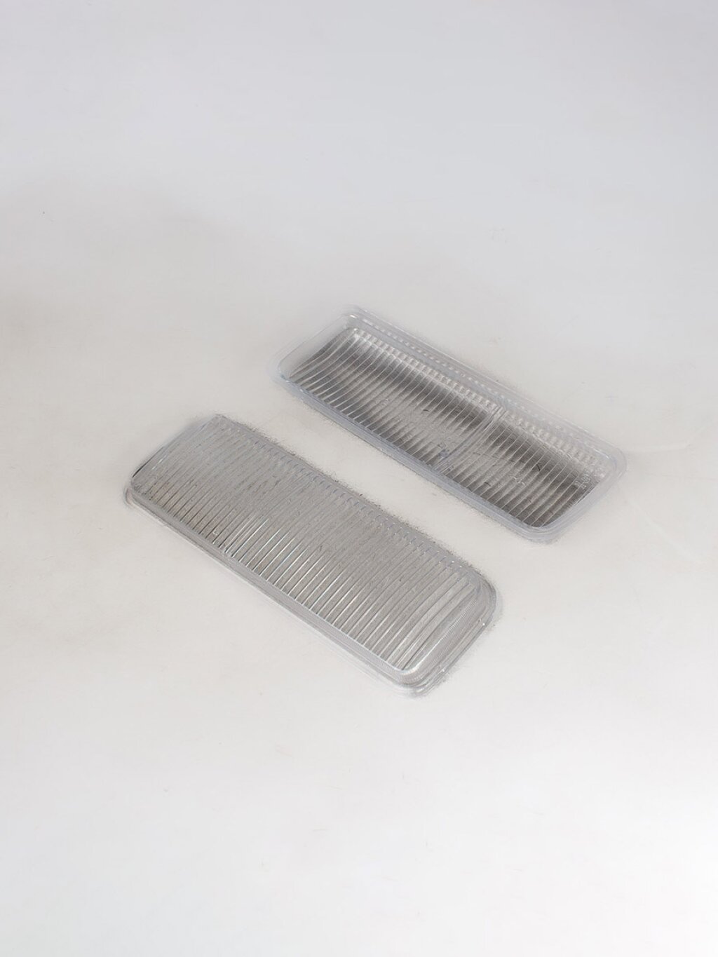 Стекло подфарника для а/м ВАЗ 21214 (белое) (2 шт.)