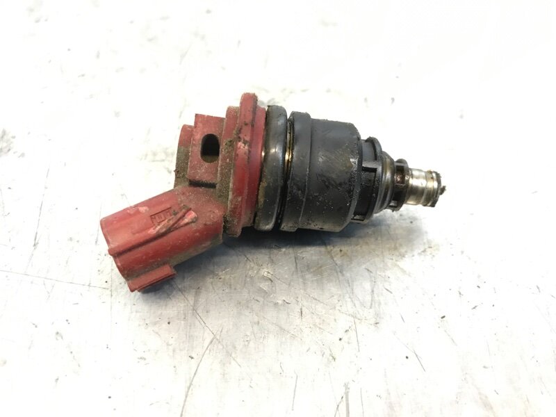 Форсунка инжекторная электрическая Nissan Bluebird 166003J100