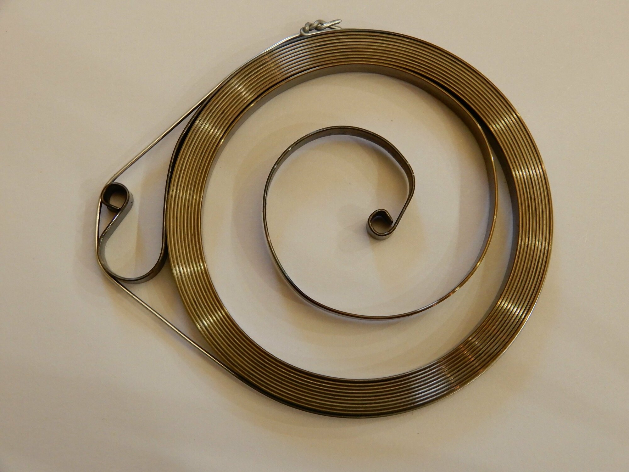 Пружина возвратная стартера бензопилы MS-180, MS-170, MS-250, MS-360 STIHL