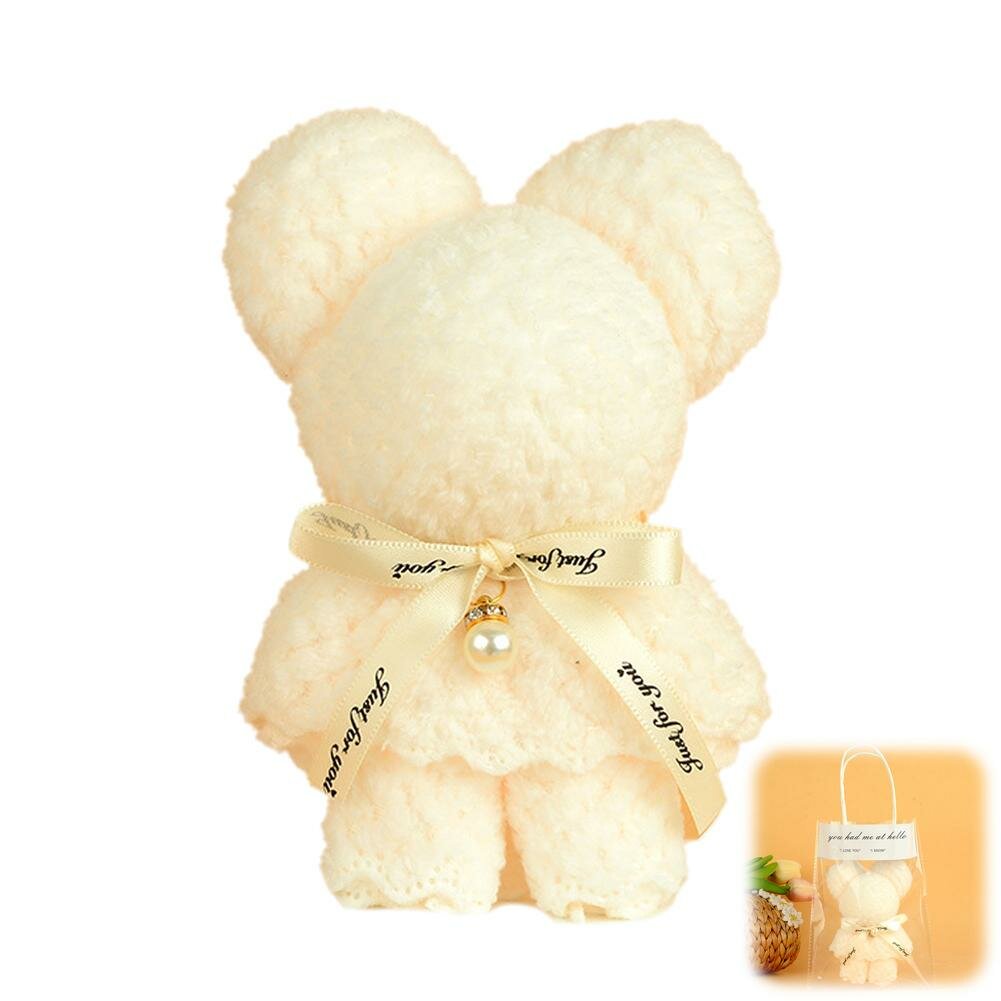 Милое сложенное полотенце в виде плюшевого мишки с бесплатными прозрачными пакетами для подарков