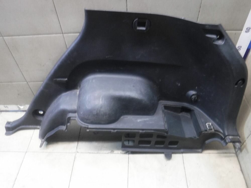 Обшивка багажника правая SsangYong Actyon I 7743034500LBA