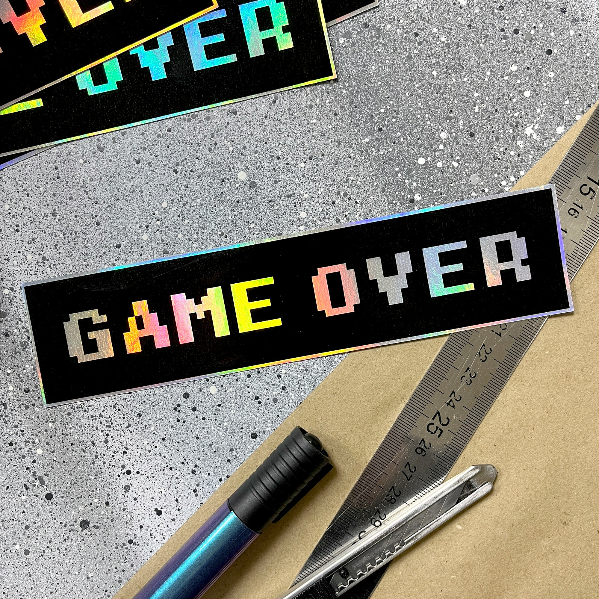 Наклейка голографическая надпись Game Over 19x4.5