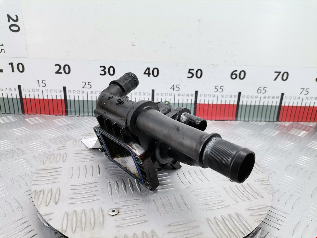 Корпус термостата Peugeot 308 1336AF арт. 1791427