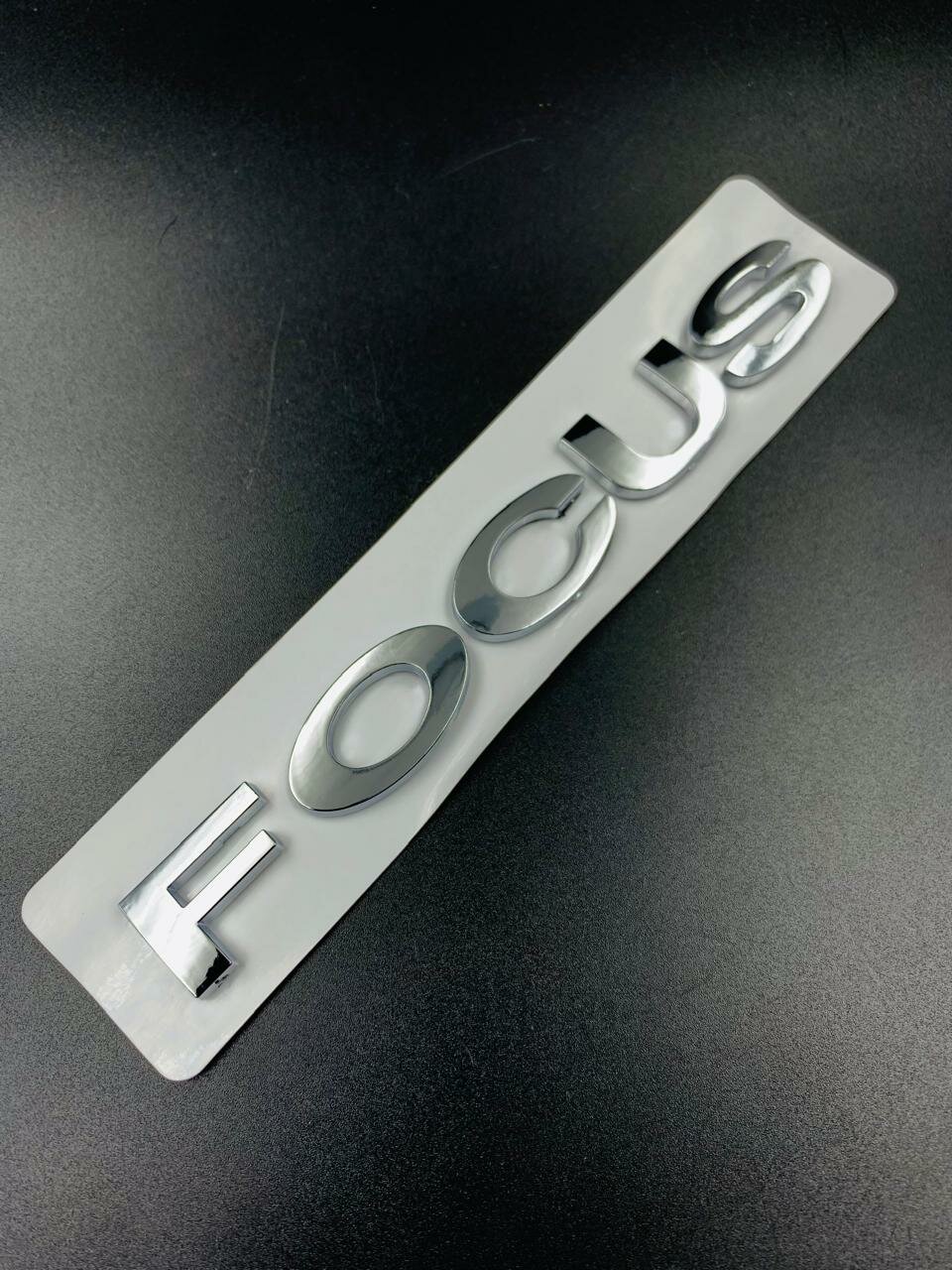 Эмблема на крышку багажника Форд Фокус (хром). Шильдик на Ford Focus (длина 145мм)