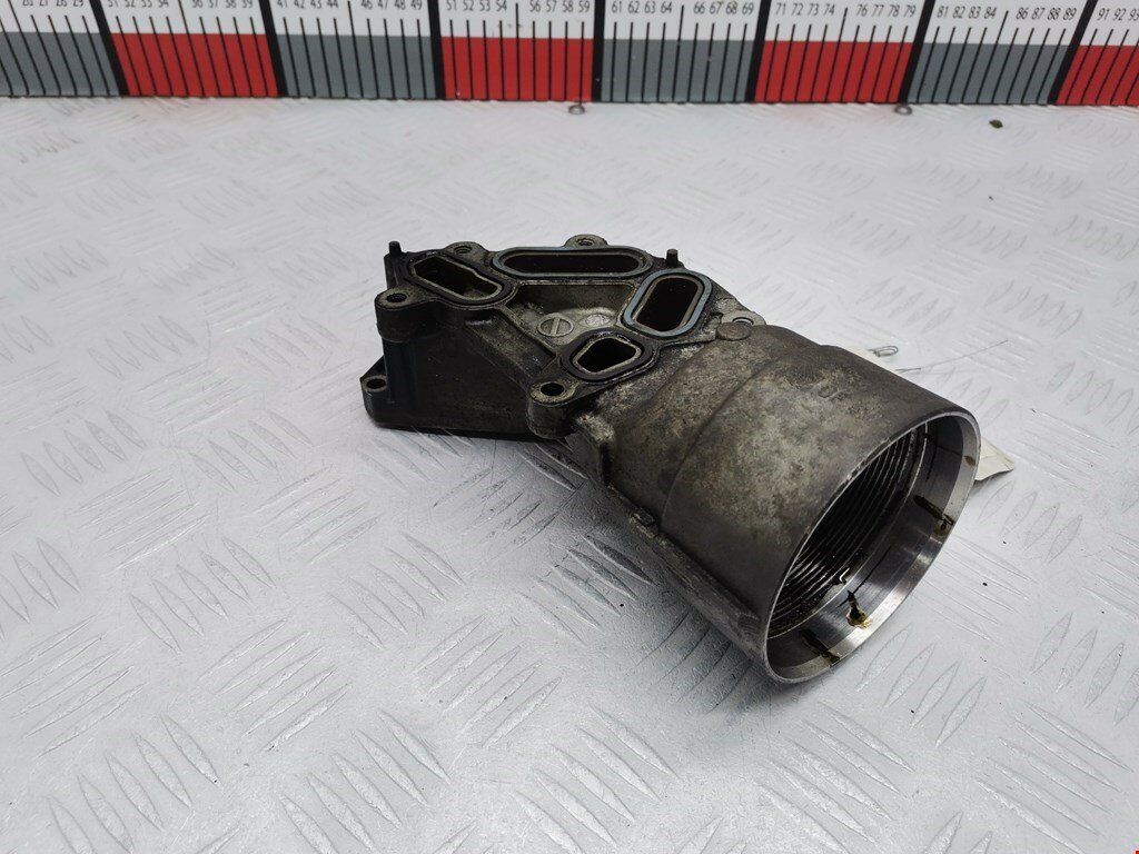 Корпус масляного фильтра Mazda 2 DY Y42514300 арт. 1548308