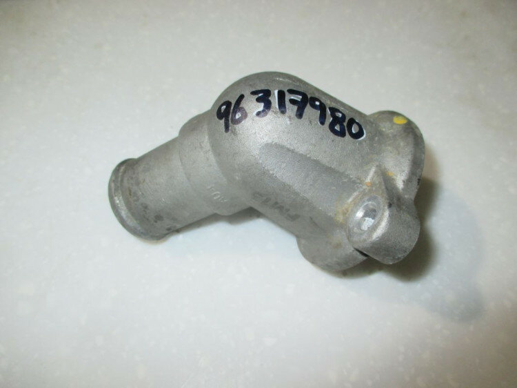 Корпус термостата 96317980 96666224 Шевроле Авео Спарк М200 Дэу Матиз 1л сам корпус термостата