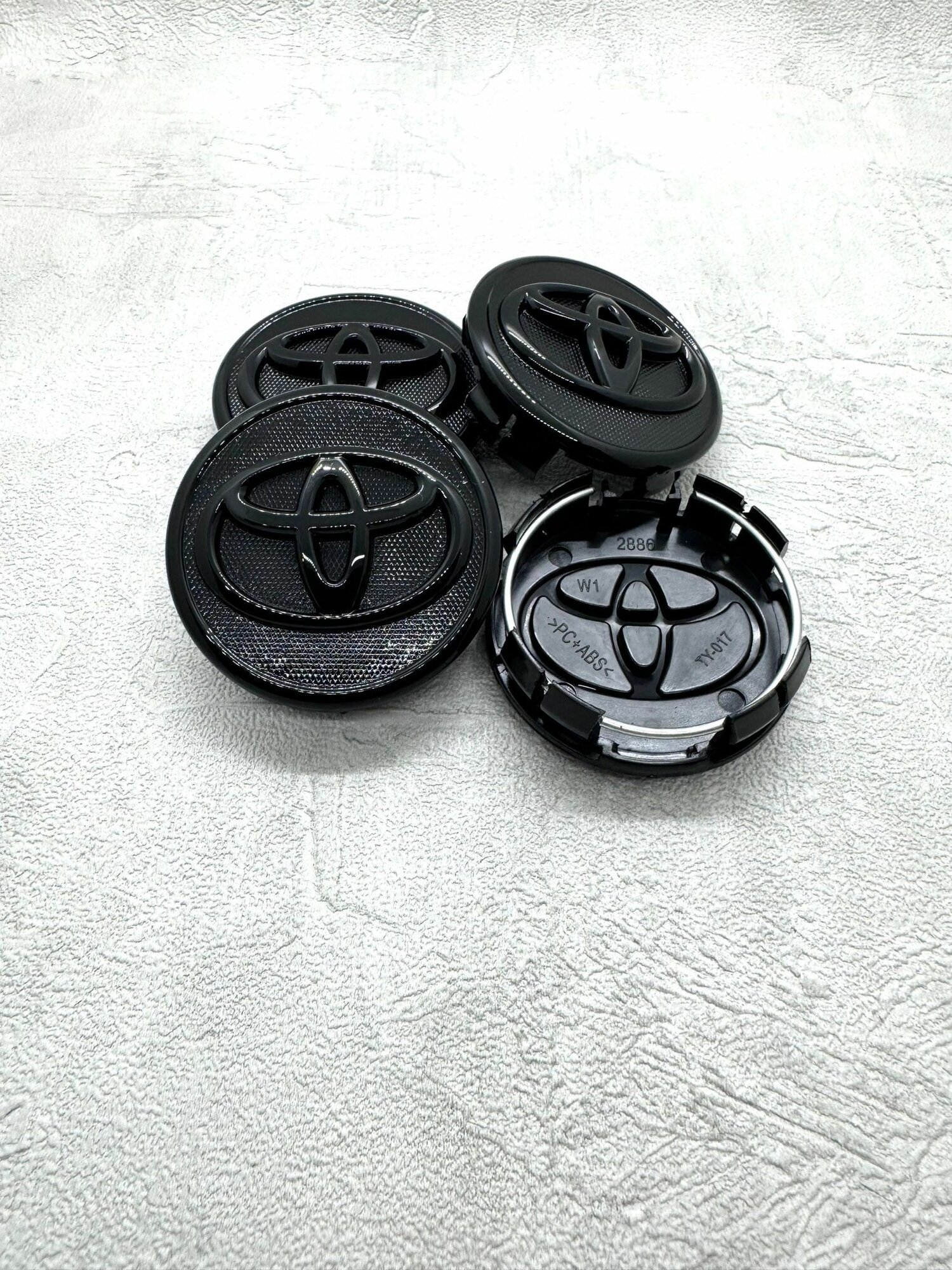 Колпачки заглушки на литые диски для Toyota 57/52мм 4 штуки.