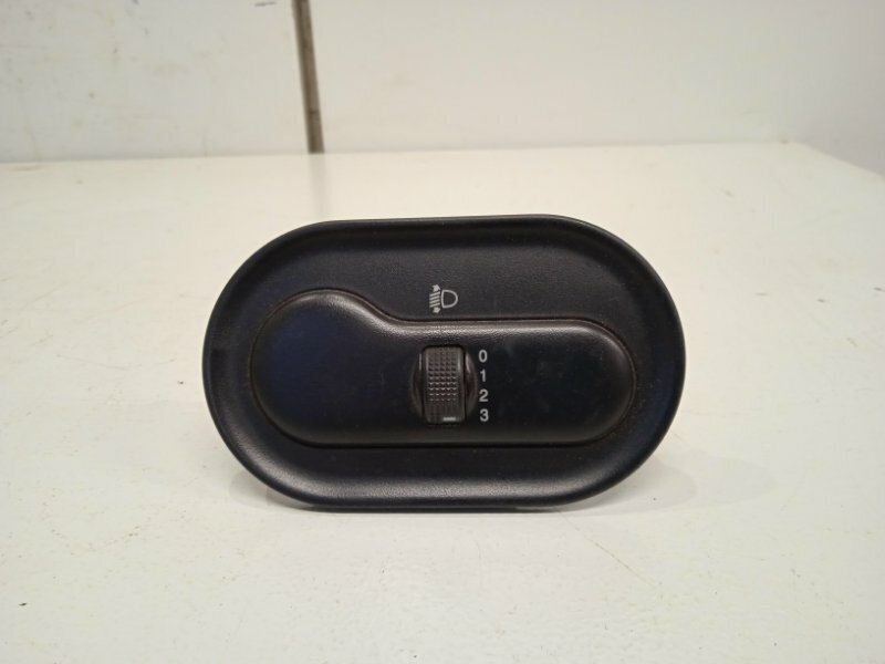 Б/У с накладкой, Шевроле Ланос Кнопка корректора фар Chevrolet Lanos 2004-2010 68501 GENERAL MOTORS арт. 96230811