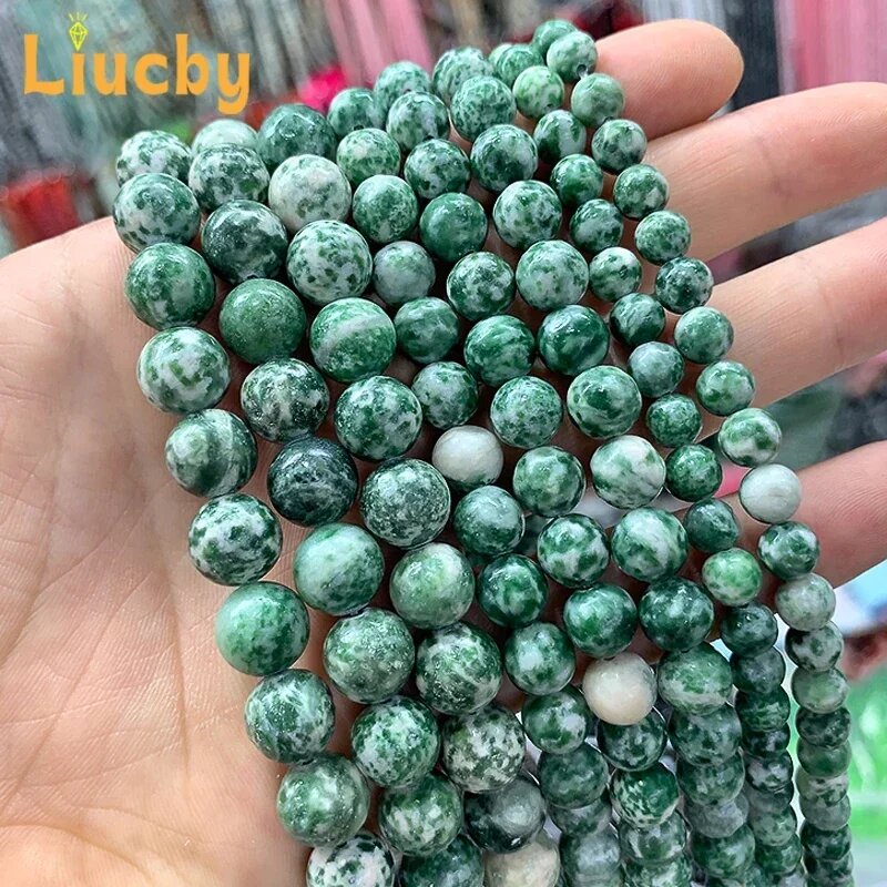 Бусины из содалита изумрудные с голубыми пятнами 15"
