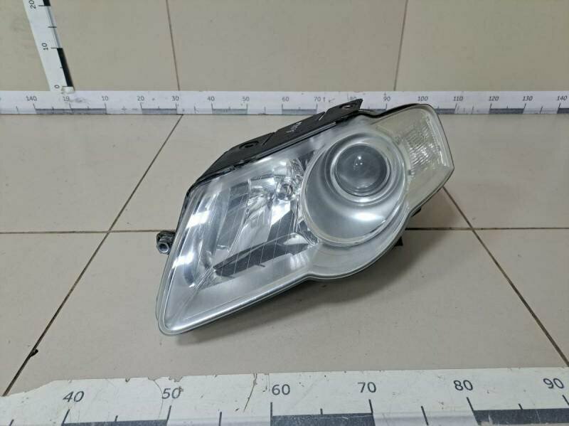 Фара левая Volkswagen Passat B6 2005-2010